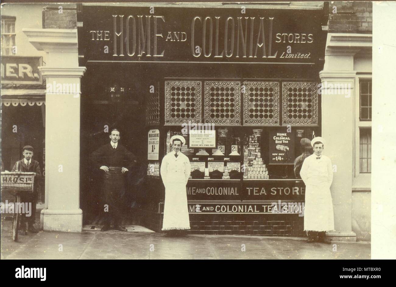 Advertising postcard for The Home & Colonial Stores Ltd Stock Photo - Alamy