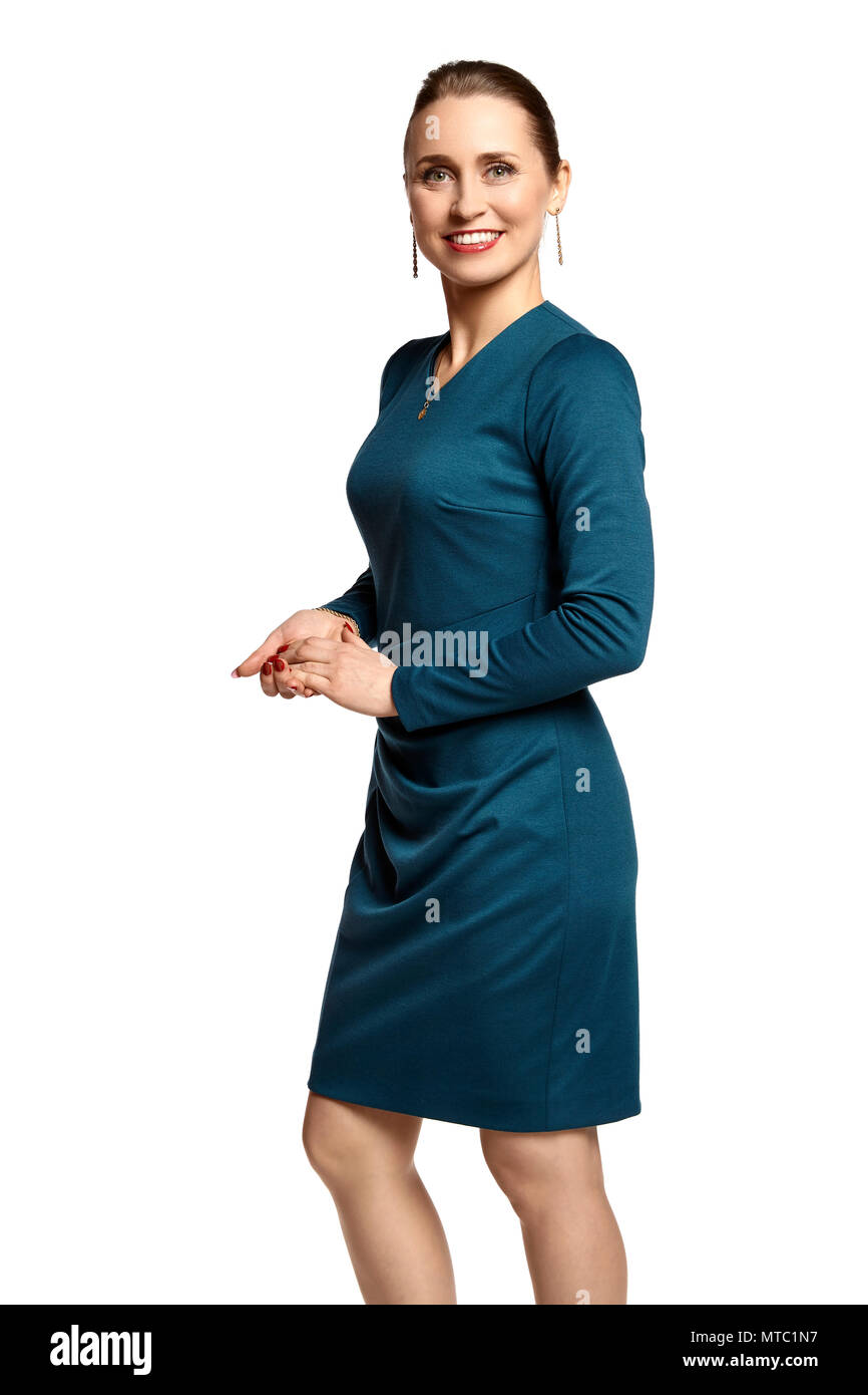 Studio shot of elegant woman in turquoise dress with white smile ...