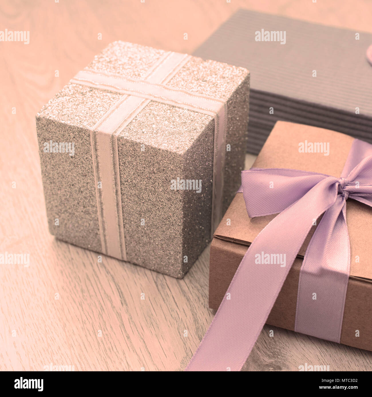 Surrealism Three Kraft gift box with gift satin ribbon bow. Wooden ...