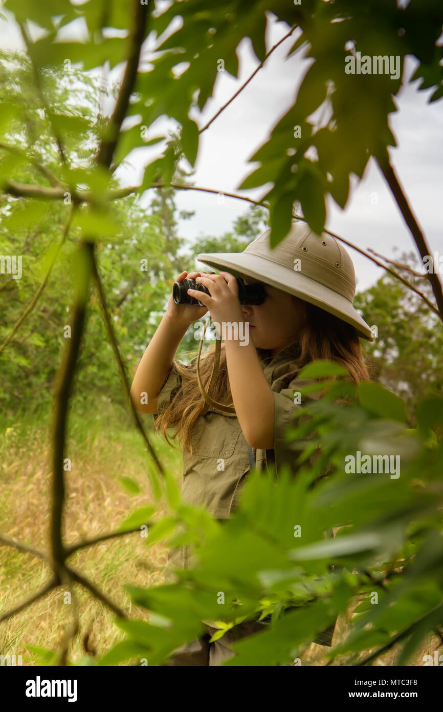 cork helmet girl in nature Stock Photo - Alamy