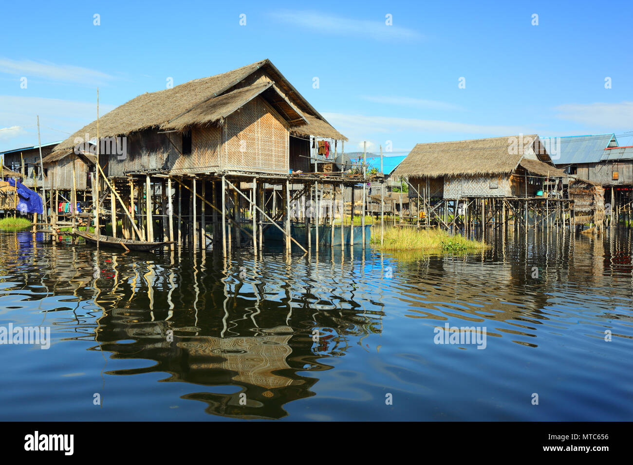 Stilted houses in village on Inle lake Stock Photo - Alamy