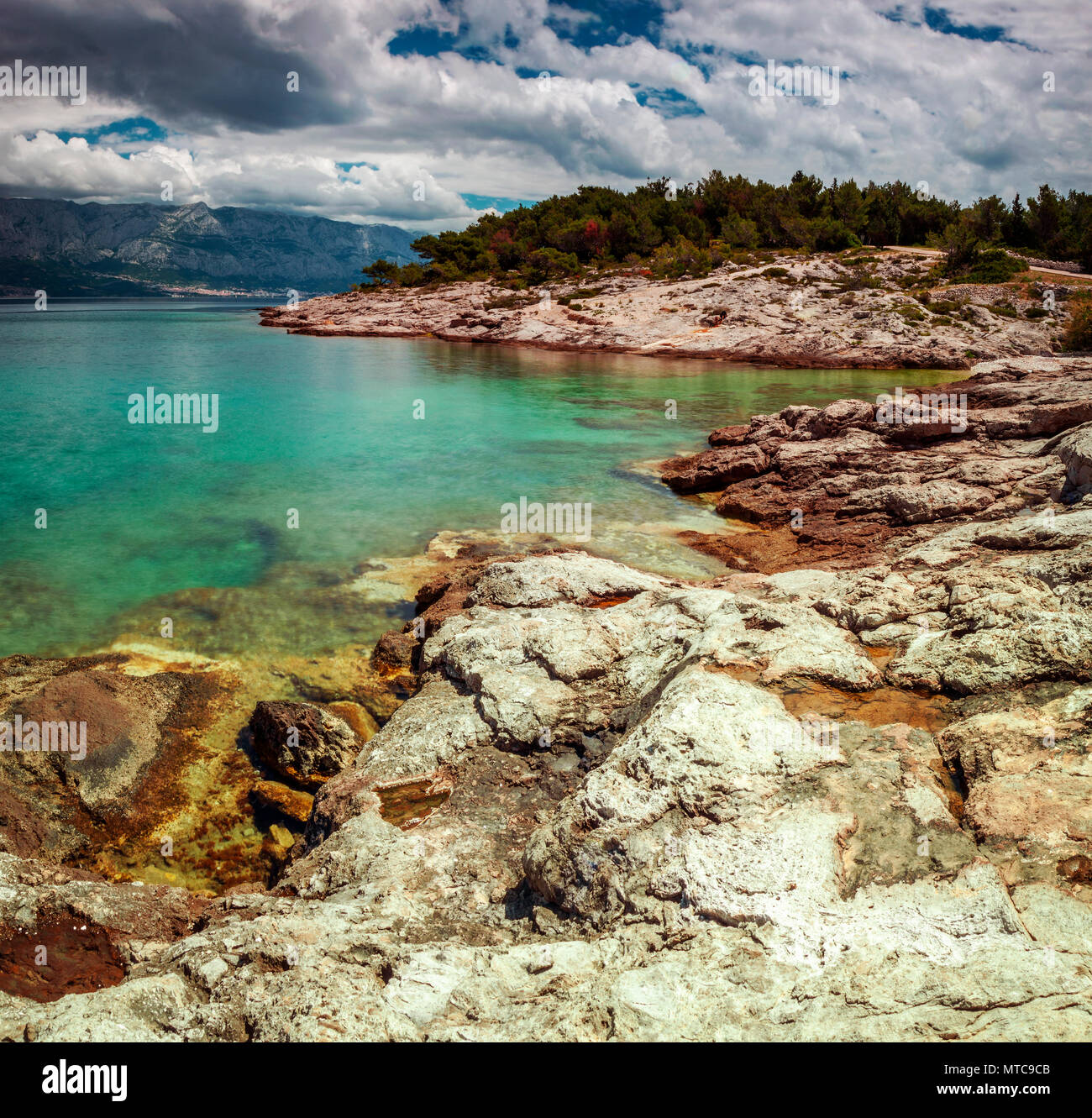 Blue lagoon shore rock cliffs hi-res stock photography and images - Alamy