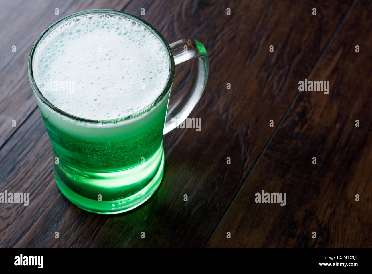 Glass of Green Beer for St Patrick's Day. Traditional Beverage Stock ...