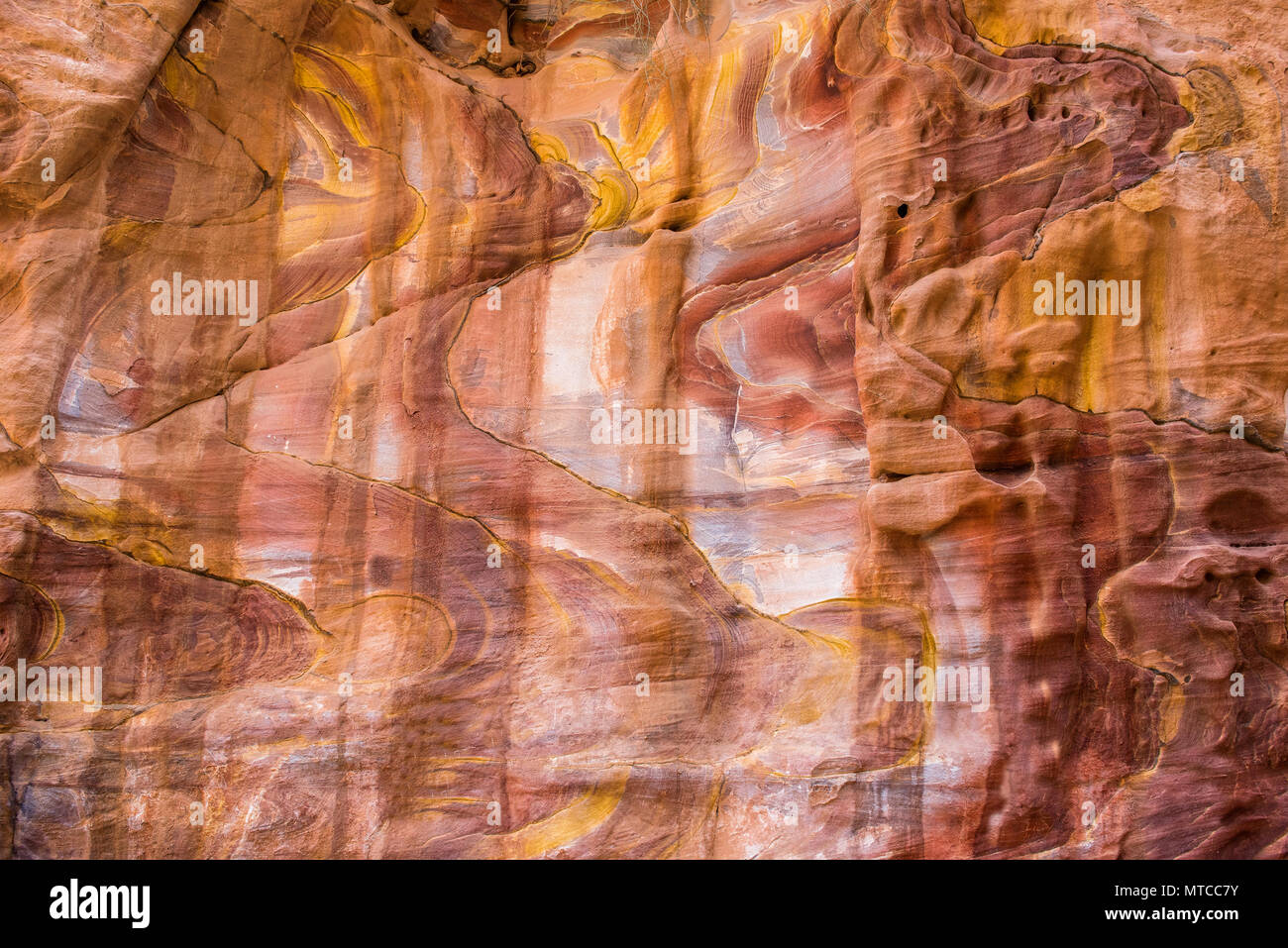 Colorful, red sandstone formation texture. Abstract geological pattern ...