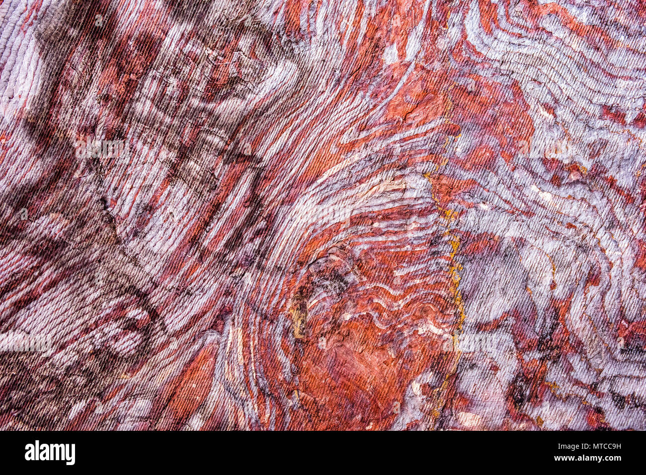 Colorful, red sandstone formation texture. Abstract geological pattern ...