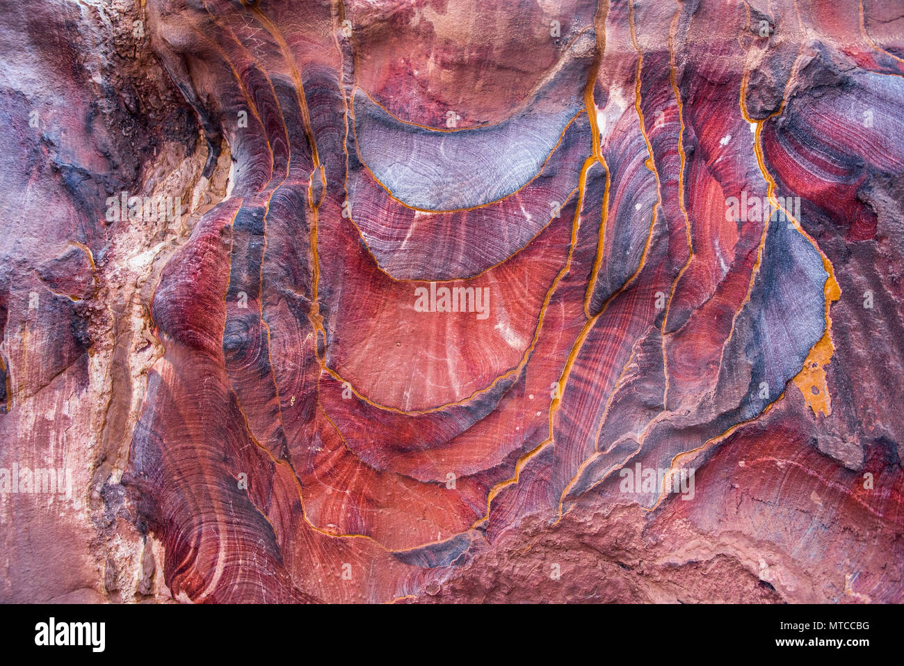 Colorful, red sandstone formation texture. Abstract geological pattern ...