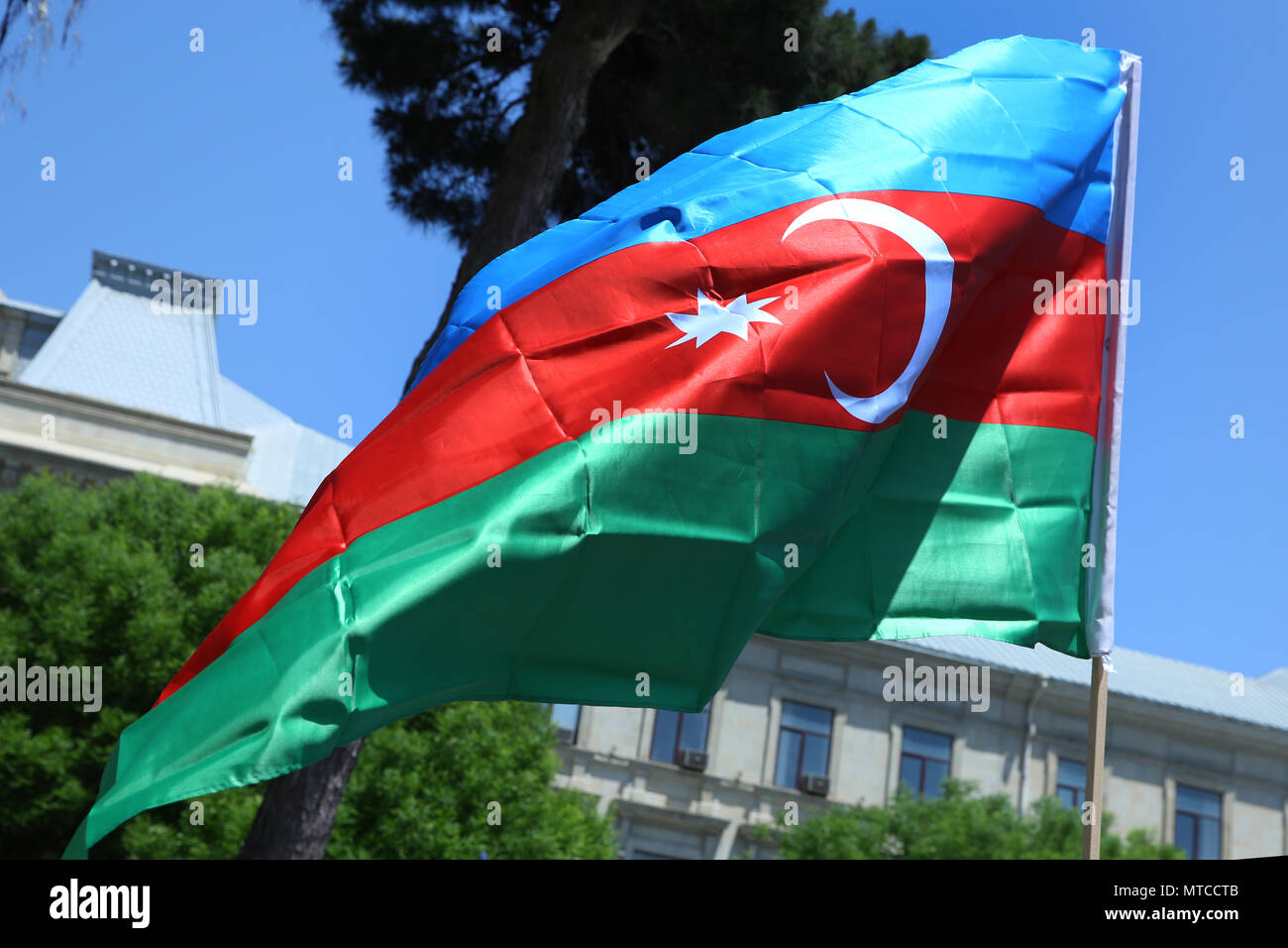 Azerbaijan flag in Baku, Azerbaijan. National sign background. Red ...