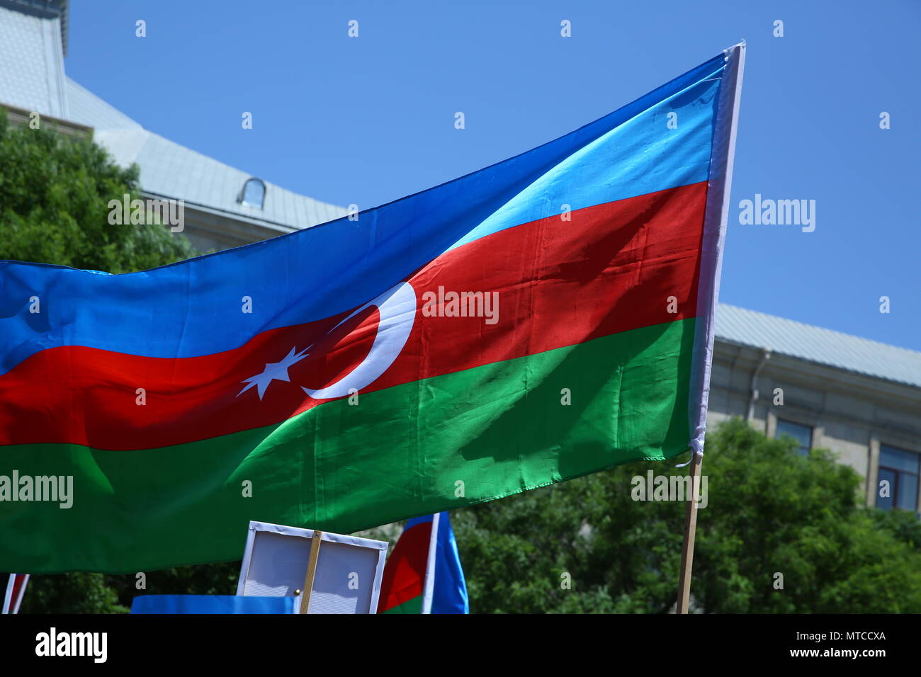 Azerbaijan flag in Baku, Azerbaijan. National sign background. Red ...