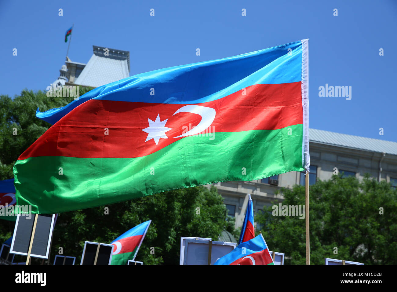 Azerbaijan flag in Baku, Azerbaijan. National sign background. Red ...