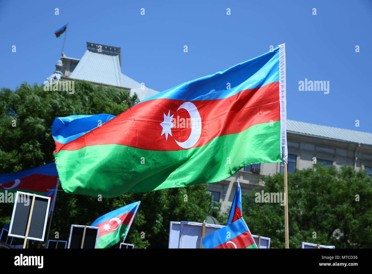 Azerbaijan flag in Baku, Azerbaijan. National sign background. Red ...