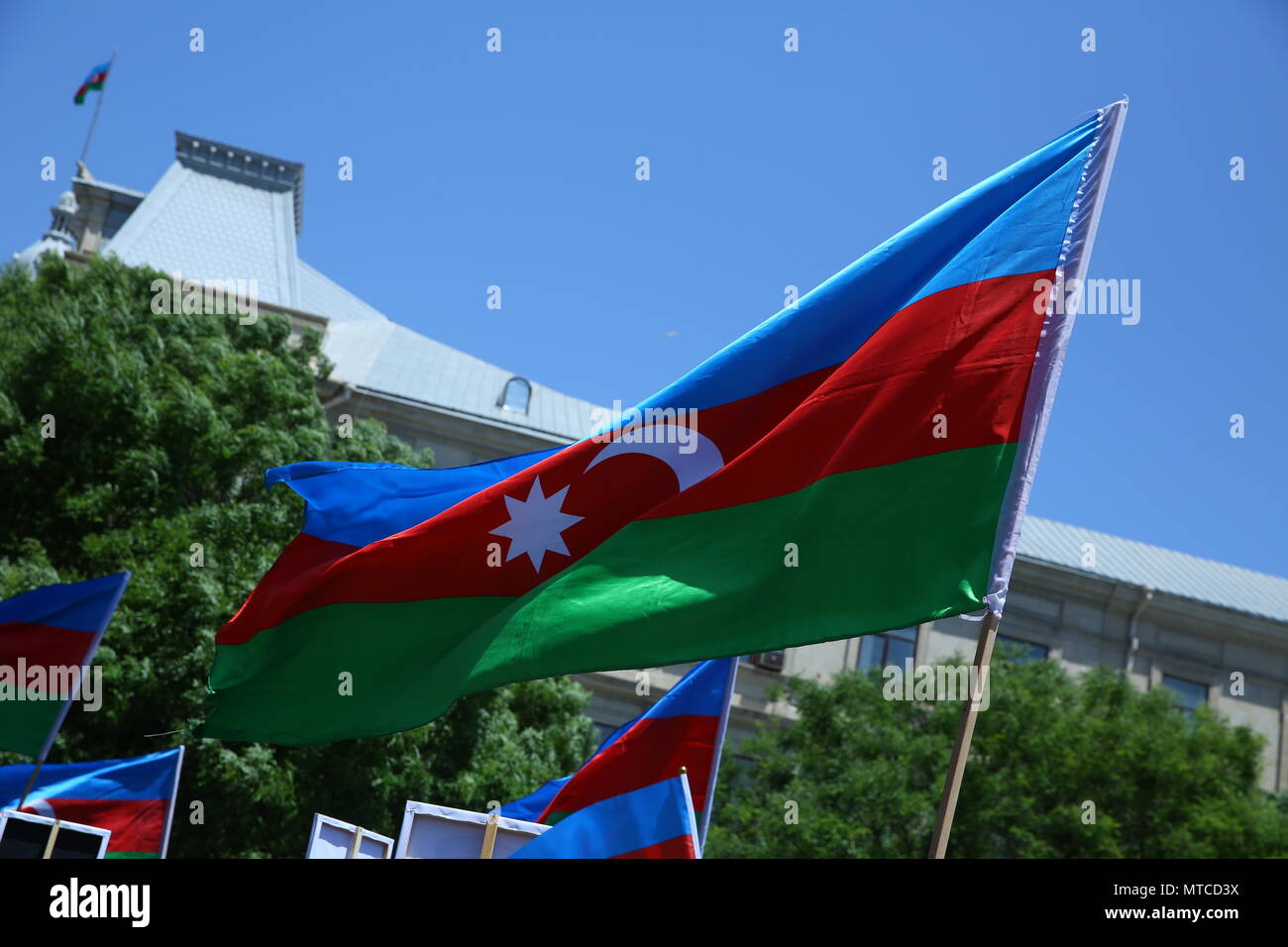 Azerbaijan flag in Baku, Azerbaijan. National sign background. Red ...