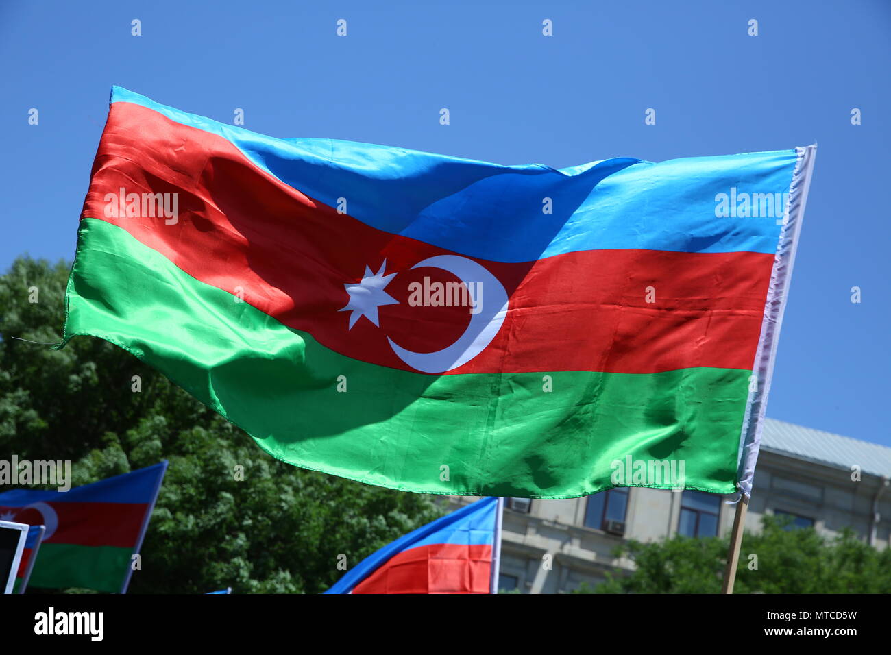 Azerbaijan flag in Baku, Azerbaijan. National sign background. Red ...