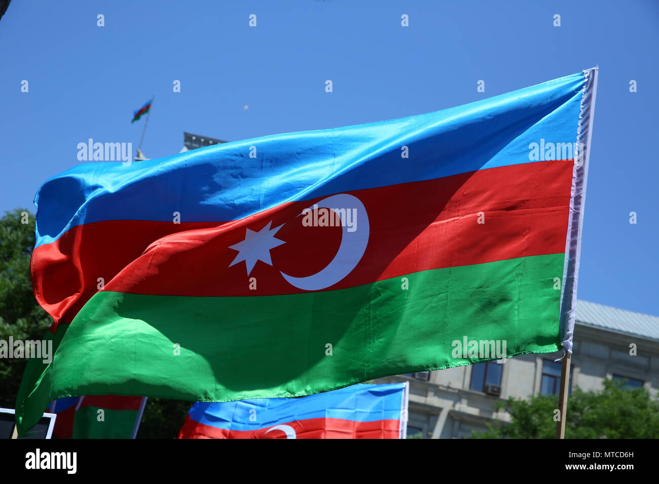 Azerbaijan flag in Baku, Azerbaijan. National sign background. Red ...