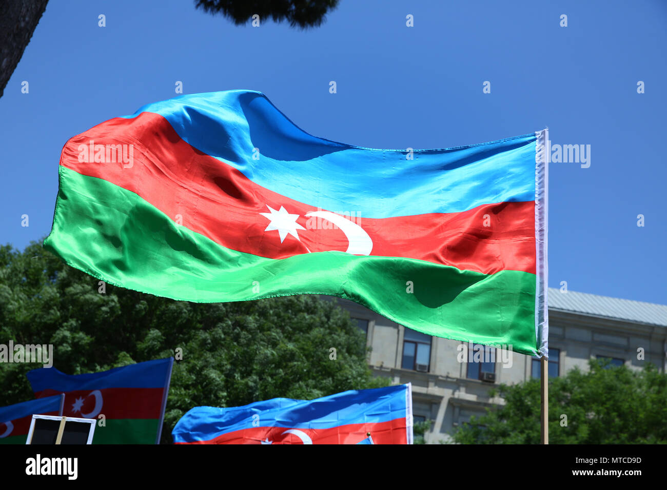 Azerbaijan flag in Baku, Azerbaijan. National sign background. Red ...