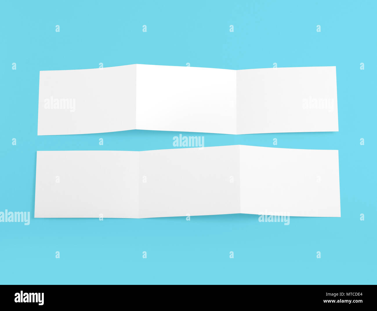 Blank folding page booklet on blue background Stock Photo - Alamy