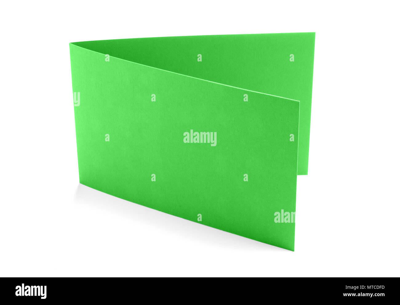 Two fold green card on white background Stock Photo - Alamy