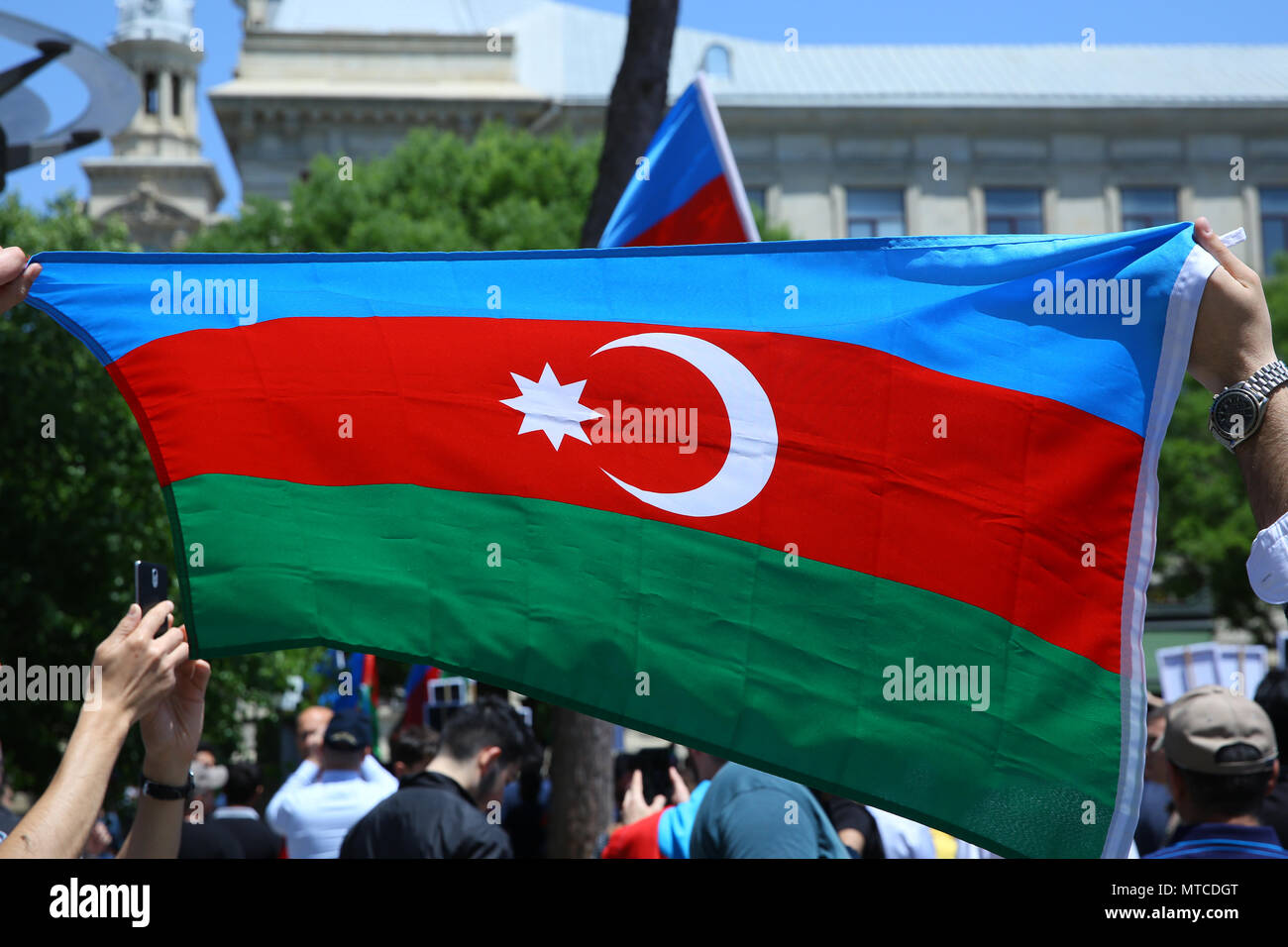 Azerbaijan flag in Baku, Azerbaijan. National sign background. Red ...