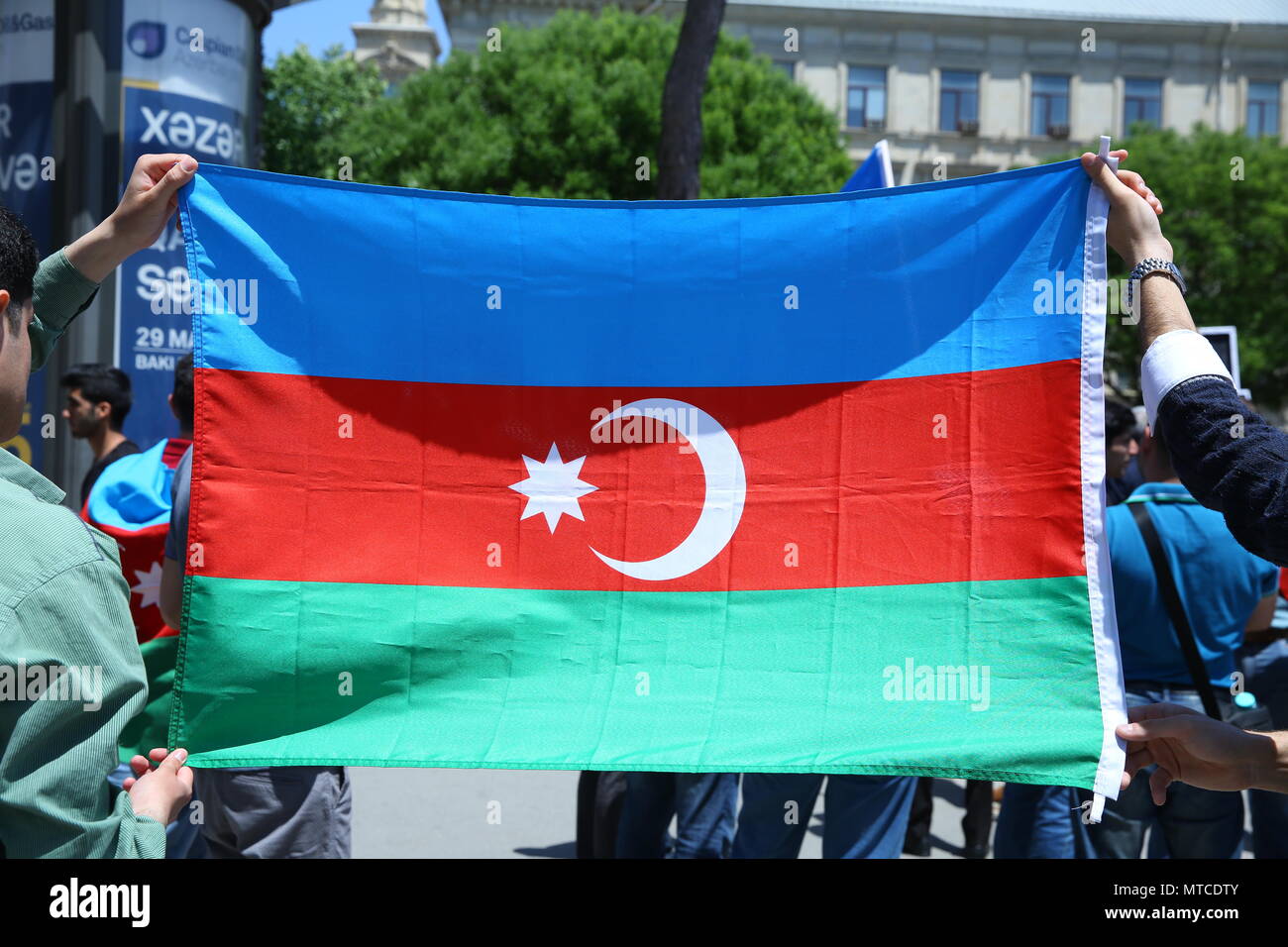 Azerbaijan flag in Baku, Azerbaijan. National sign background. Red ...