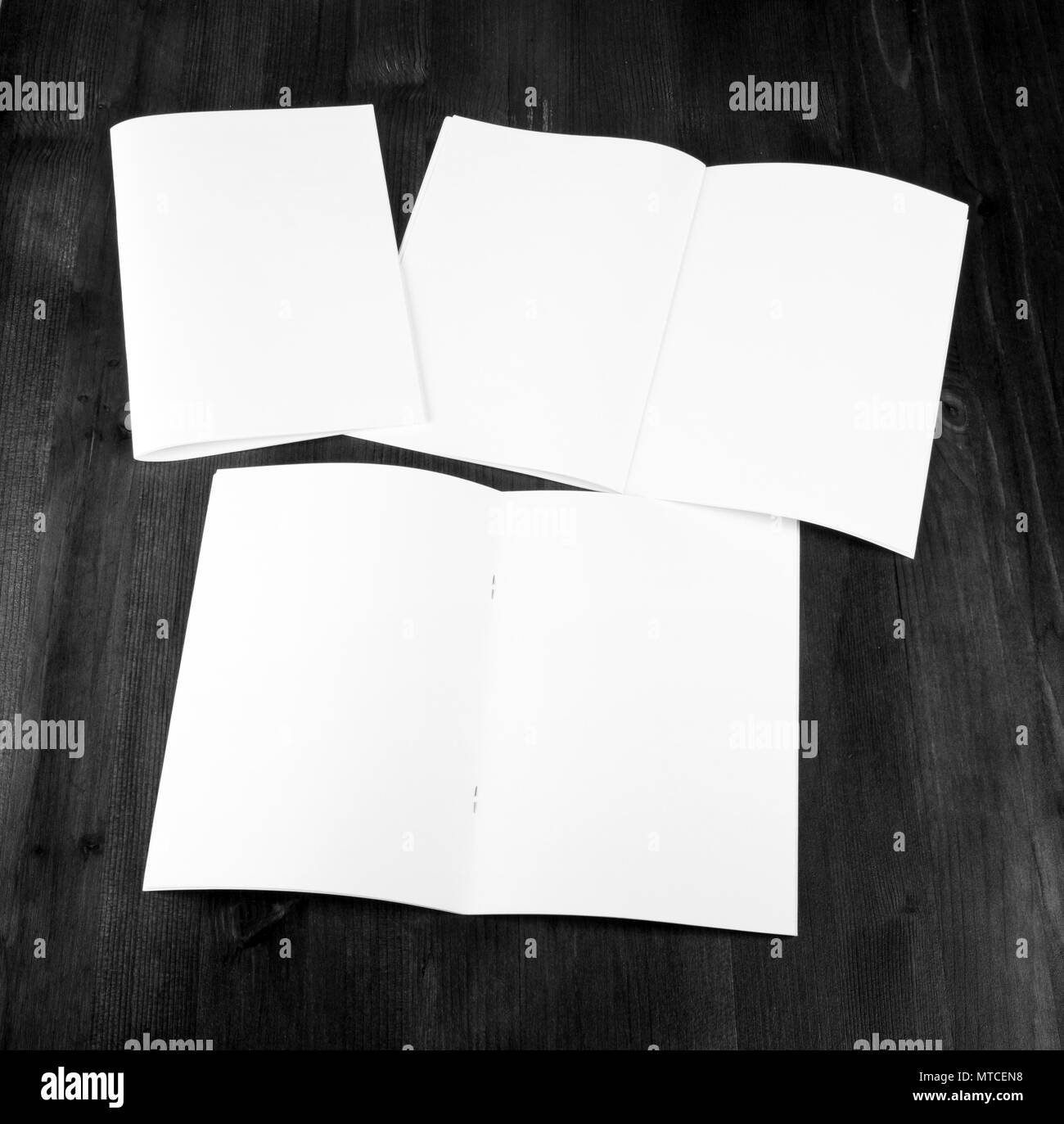 Blank catalog, brochure, book mock up. Empty opened magazine on wooden ...