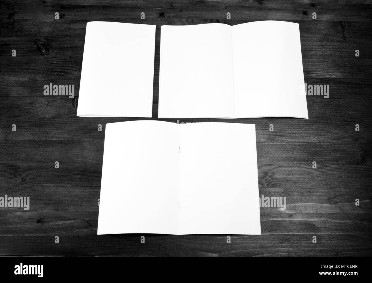 Blank catalog, brochure, book mock up. Empty opened magazine on wooden ...
