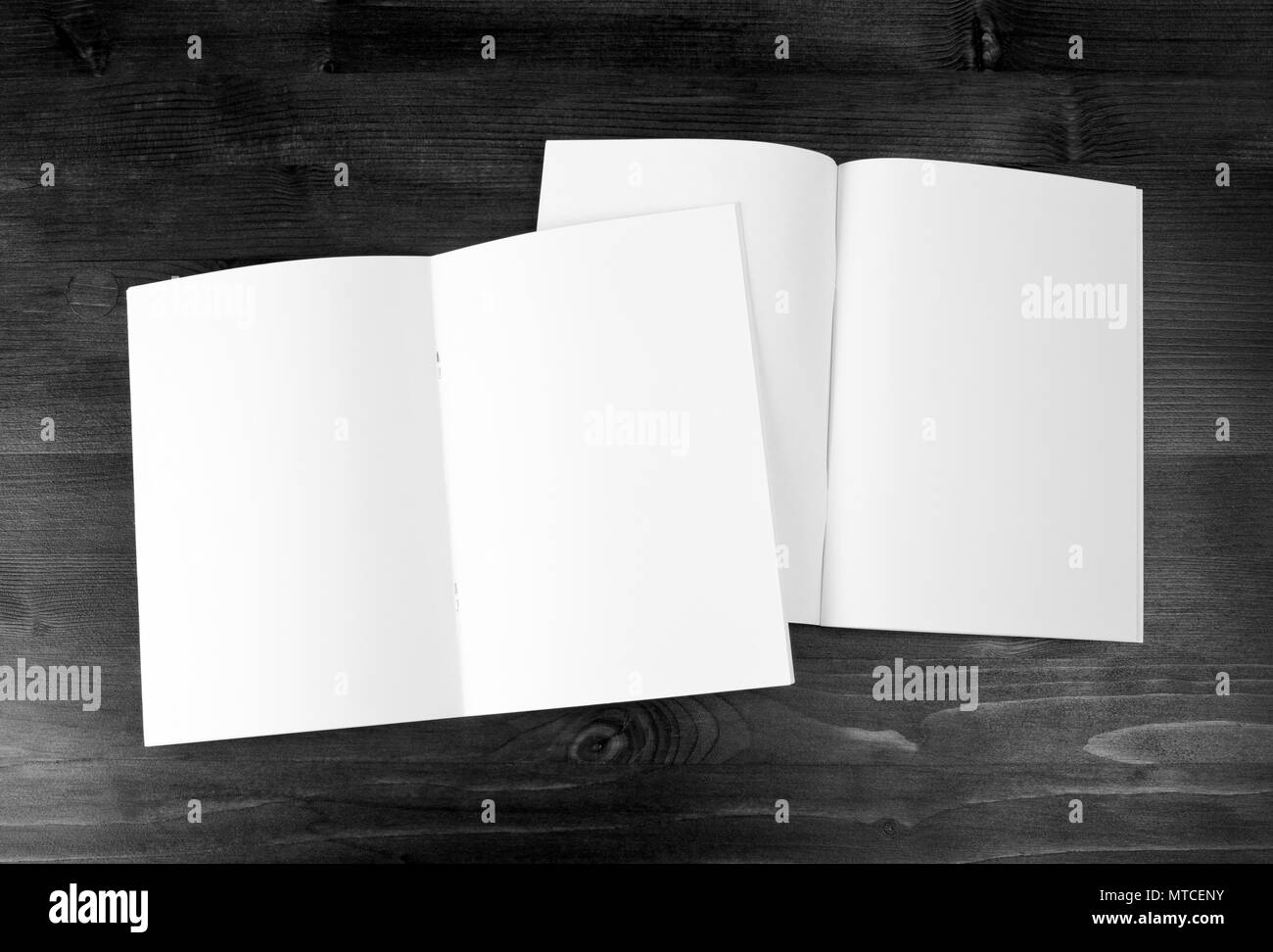 Blank catalog, brochure, book mock up. Empty opened magazine on wooden ...