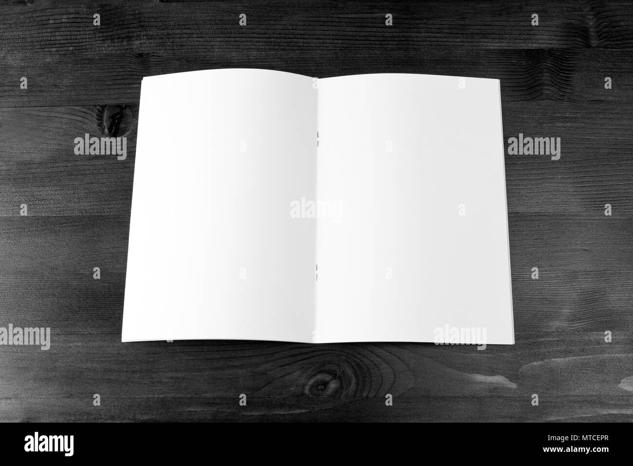 Blank catalog, brochure, book mock up. Empty opened magazine on wooden ...