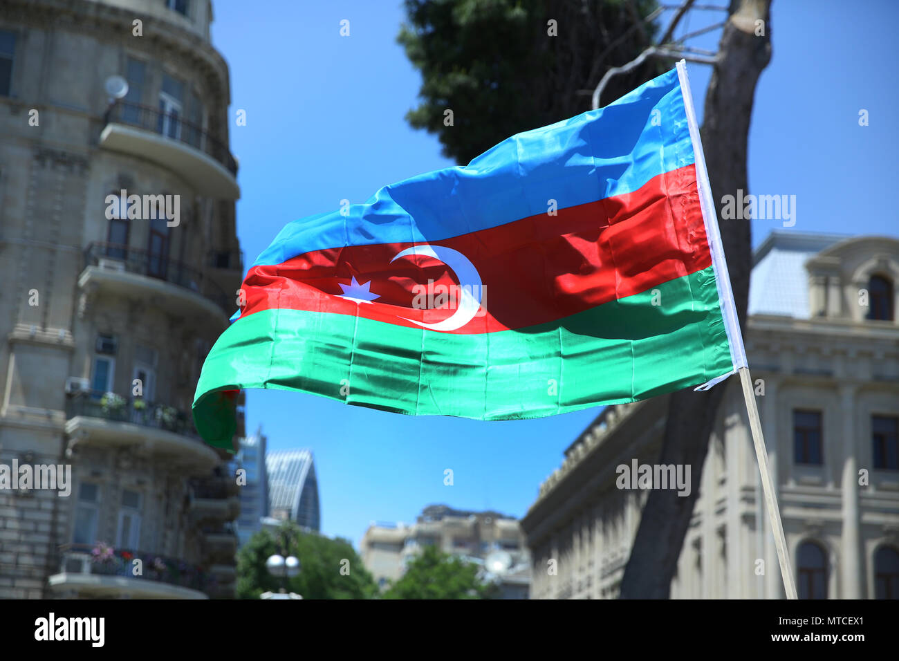 Azerbaijan flag in Baku, Azerbaijan. National sign background. Red ...
