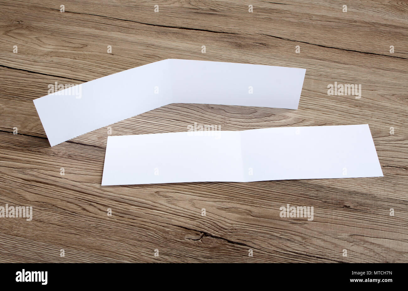 White empty card on wooden background to replace your design Stock ...