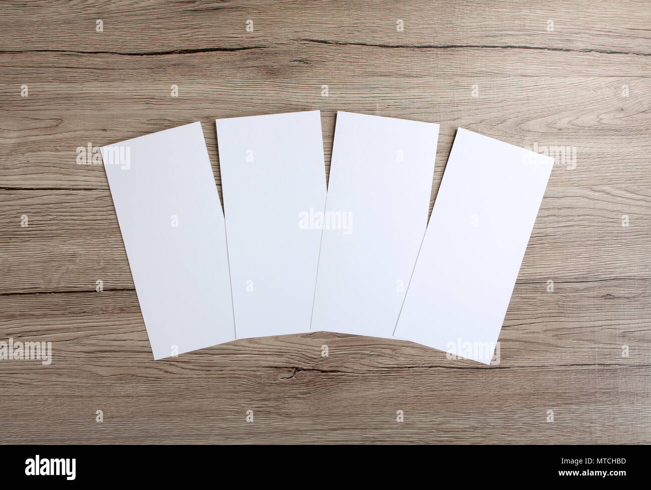 Blank flyer over wooden background to replace your design Stock Photo ...