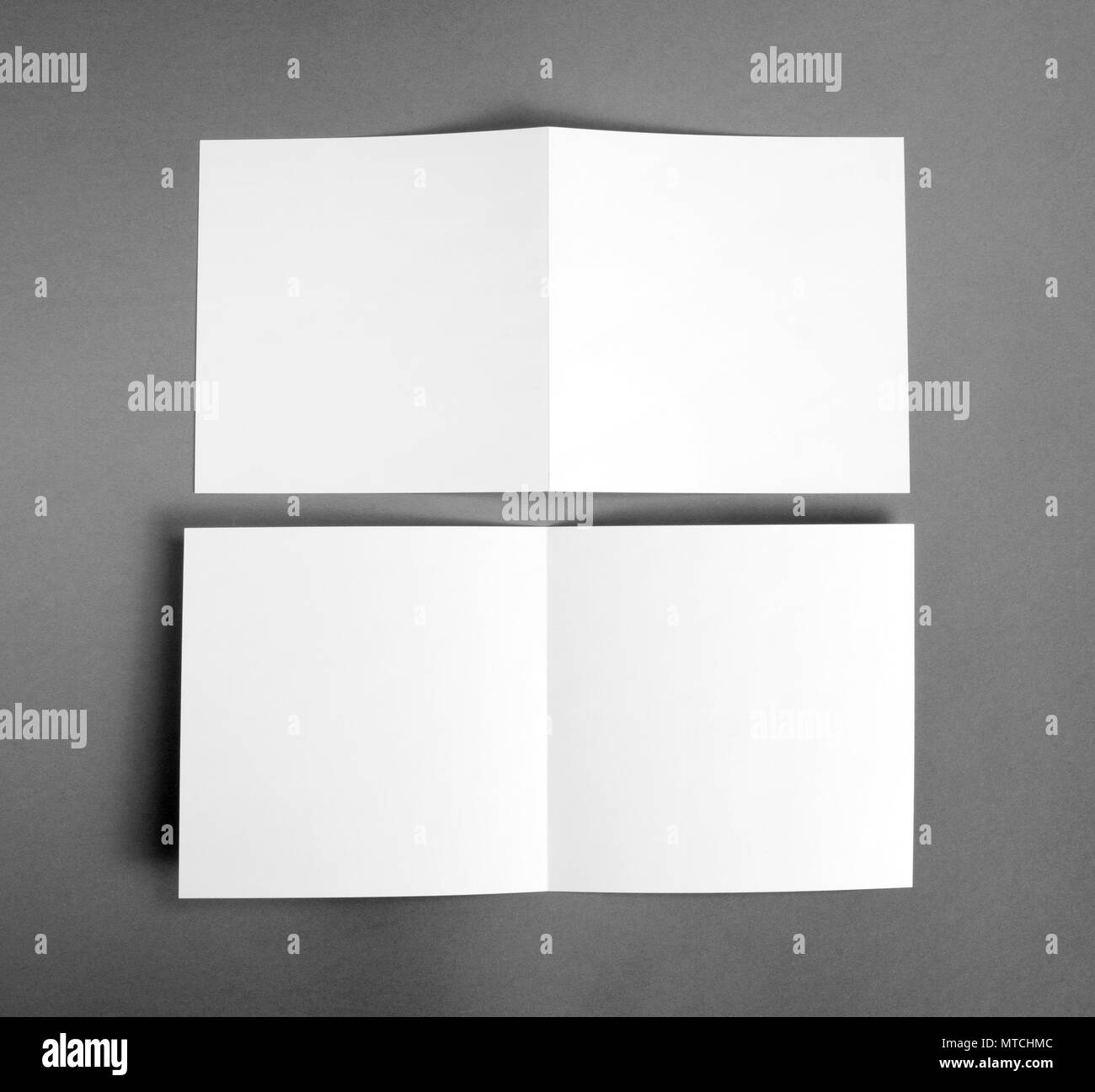White empty card on grey to replace your design Stock Photo - Alamy
