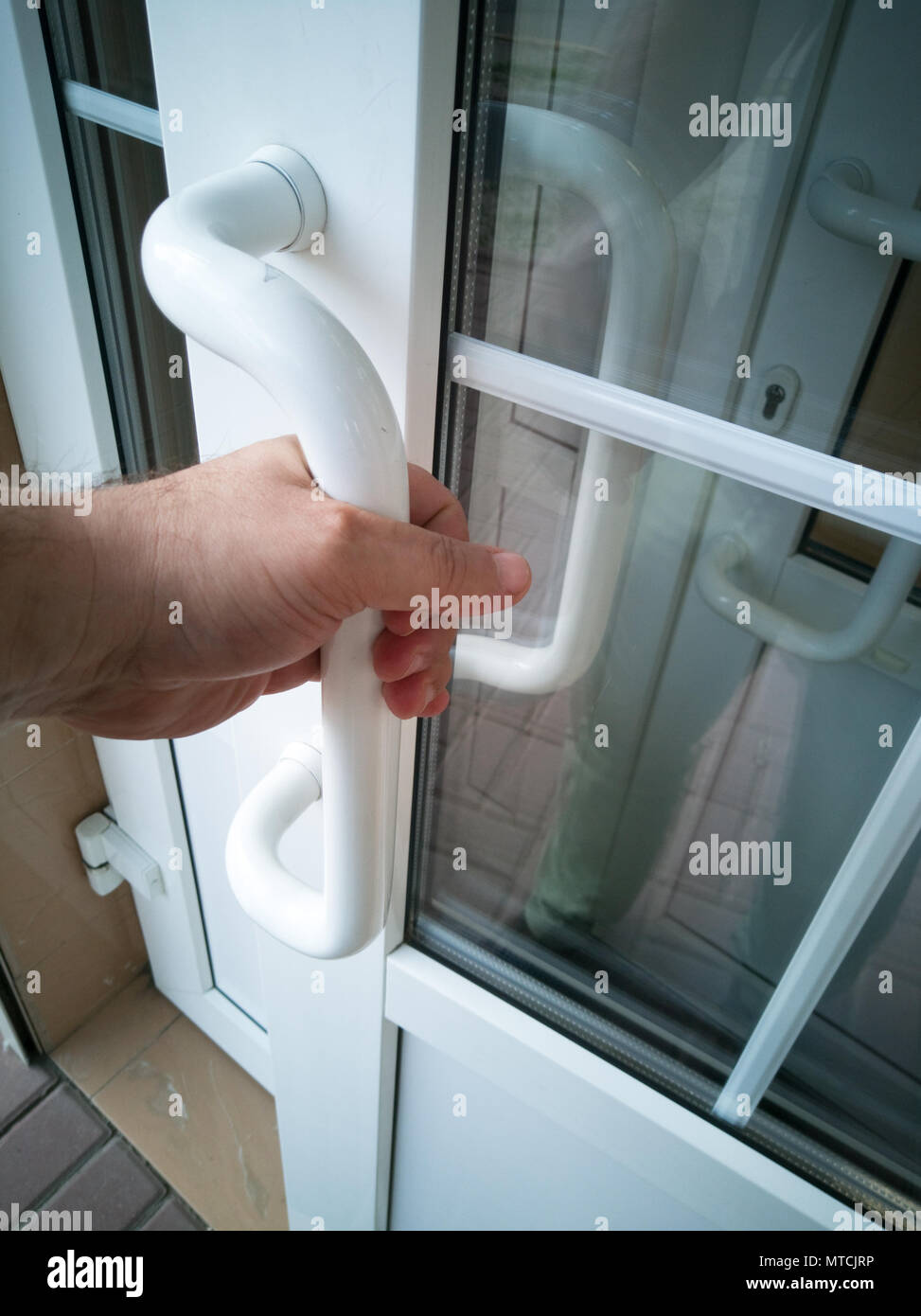 Hand door frame hi-res stock photography and images - Alamy