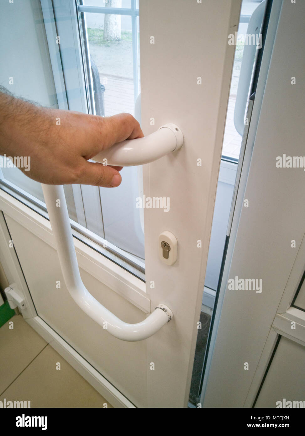 Hand door frame hi-res stock photography and images - Alamy
