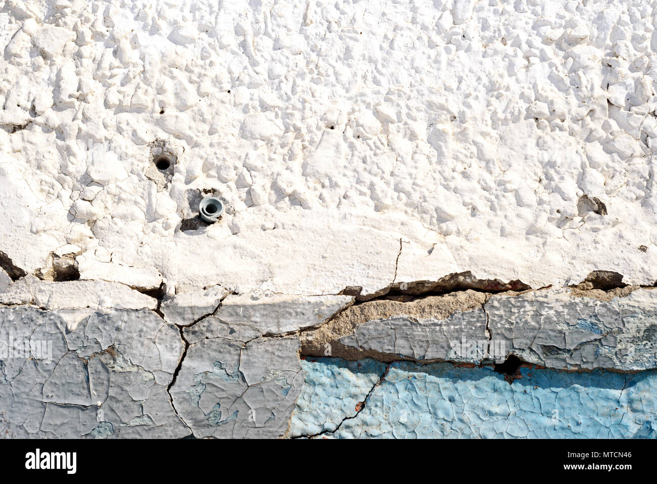 Old flaking blue paint with an orange vibrant undercoat showing up ...