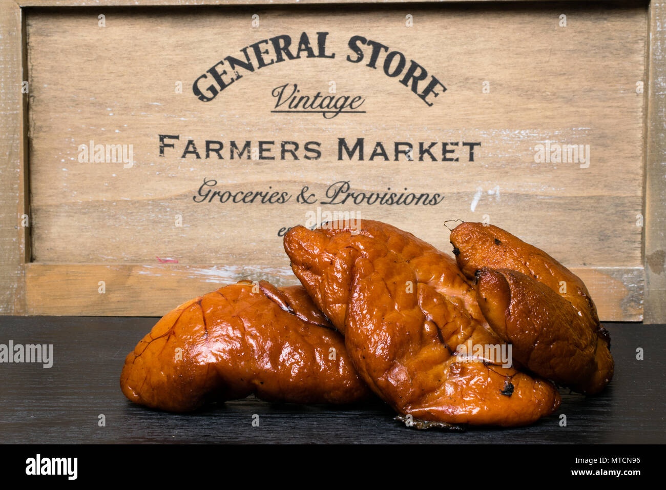 raw smoked cod caviar in wooden background Stock Photo - Alamy