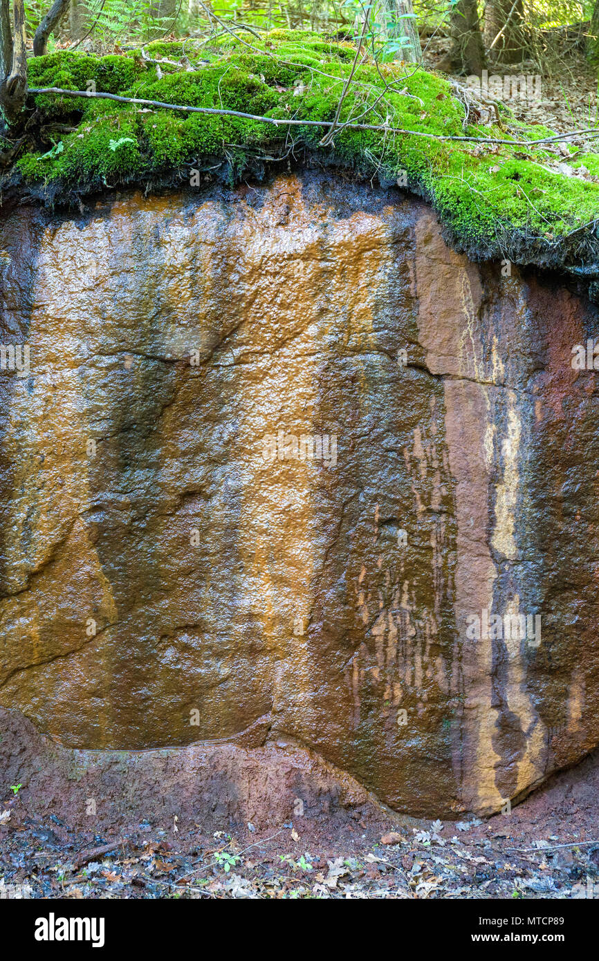 Water trickling down rock face outdoors Stock Photo - Alamy