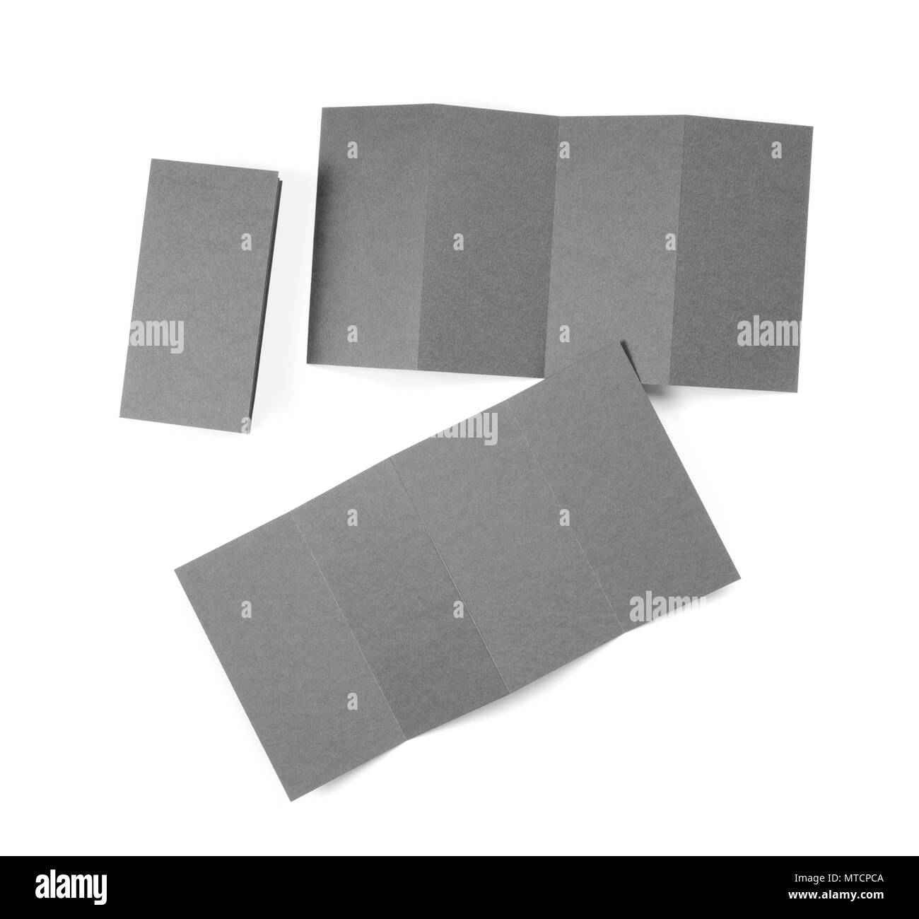 Blank folded paper leaflet or flyer mockup Stock Photo - Alamy