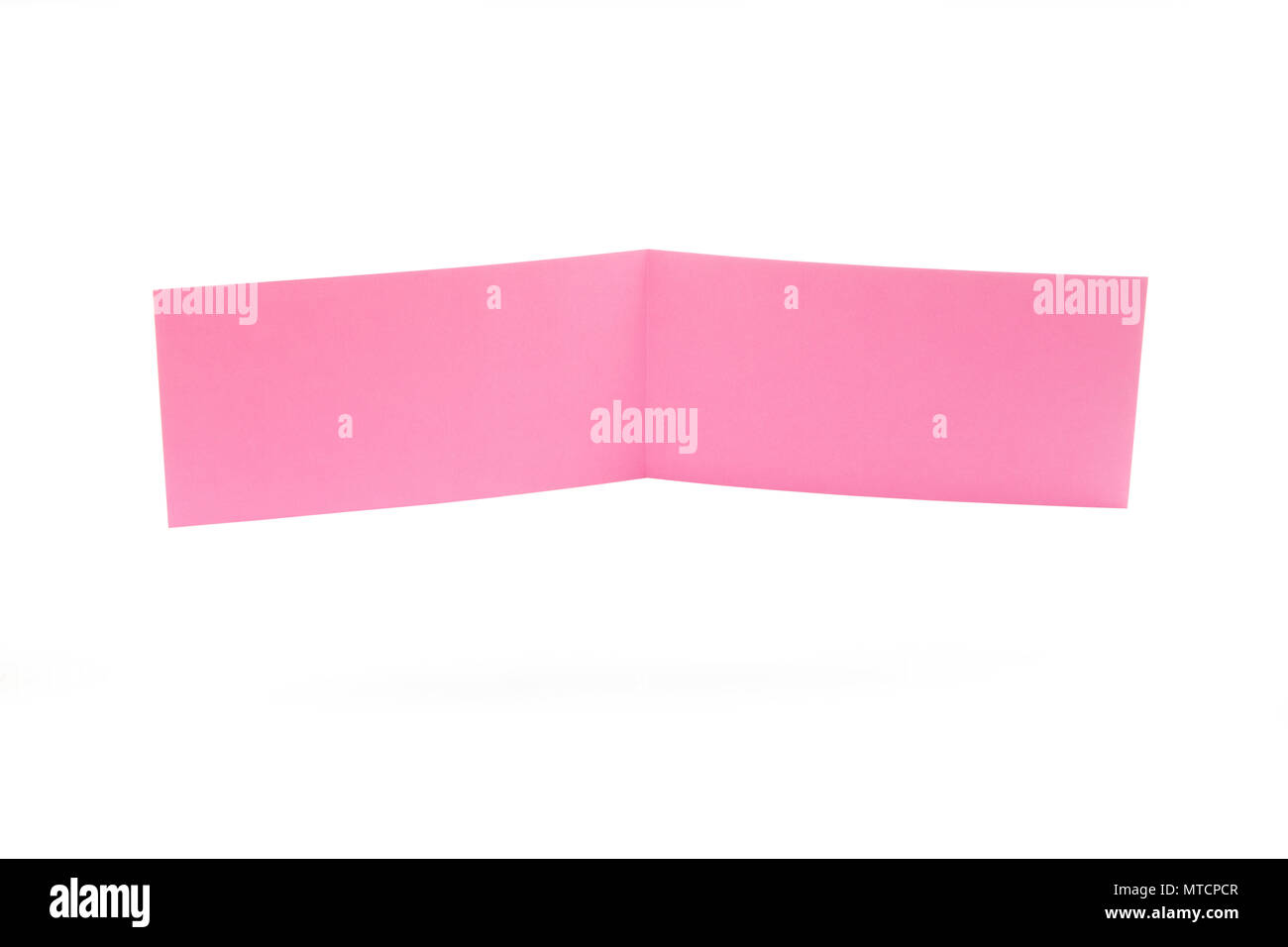 Two fold pink flyers or leaflets on white Stock Photo - Alamy