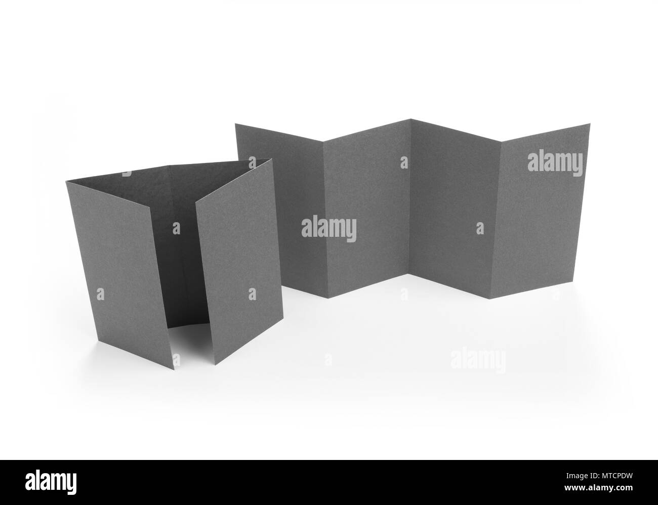 Blank folded paper leaflet or flyer mockup Stock Photo - Alamy