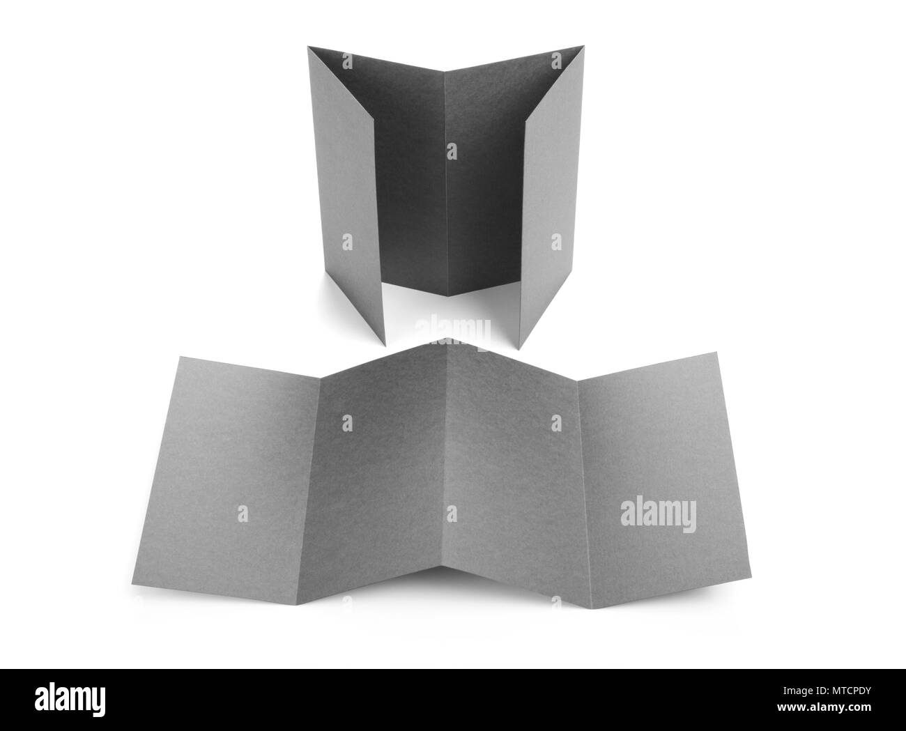 Blank folded paper leaflet or flyer mockup Stock Photo - Alamy