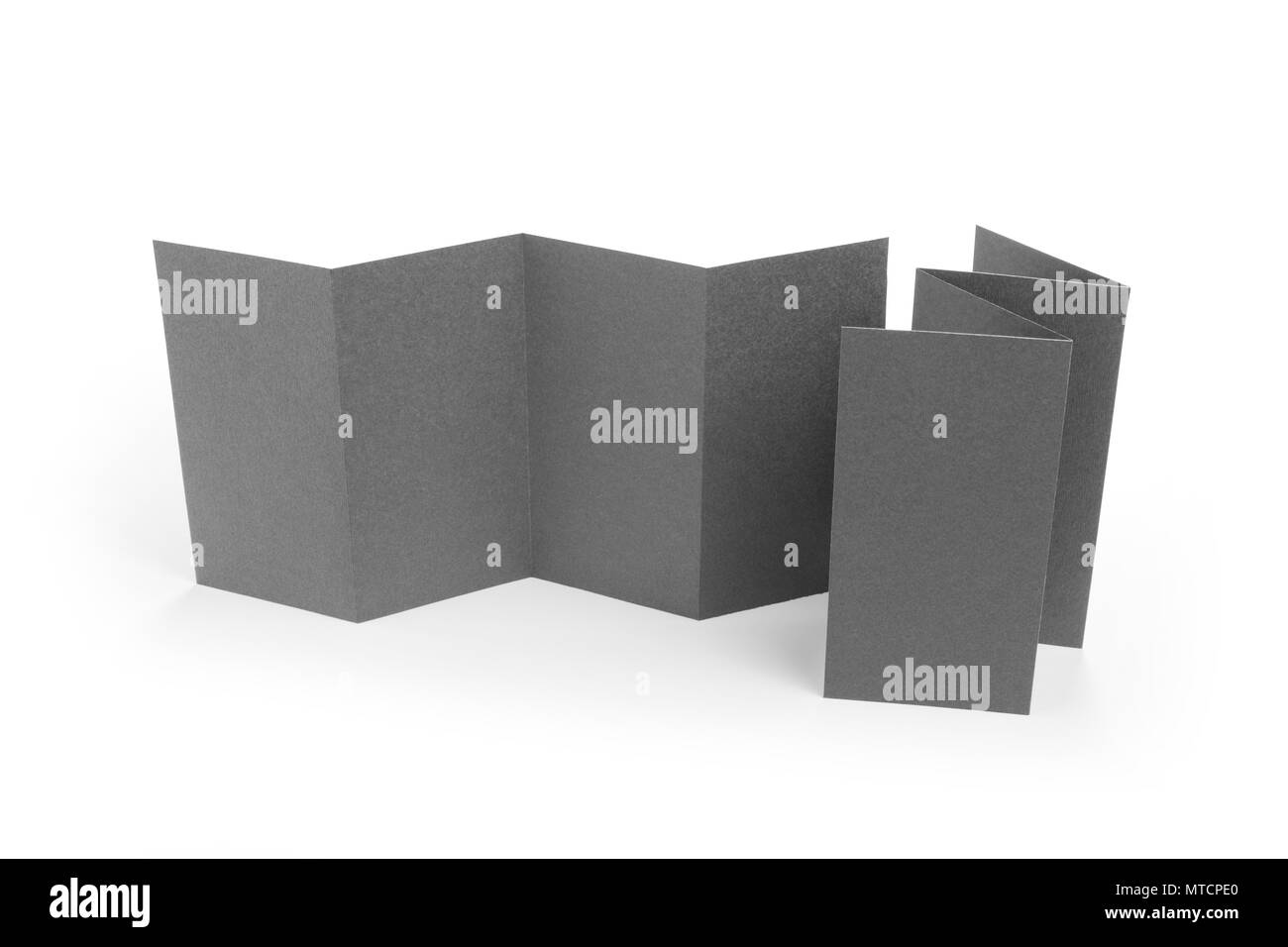 Blank folded paper leaflet or flyer mockup Stock Photo - Alamy