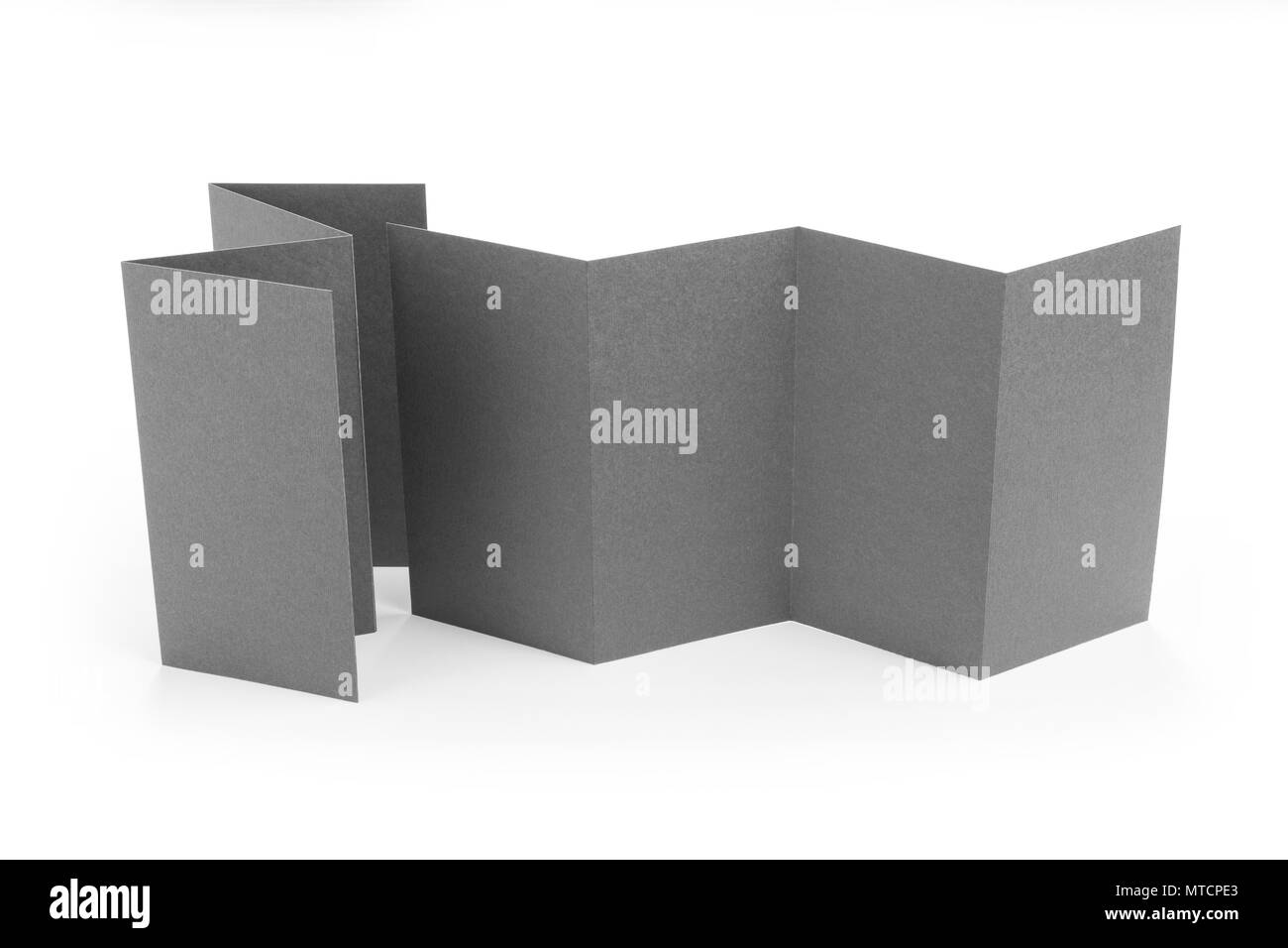 Blank folded paper leaflet or flyer mockup Stock Photo - Alamy