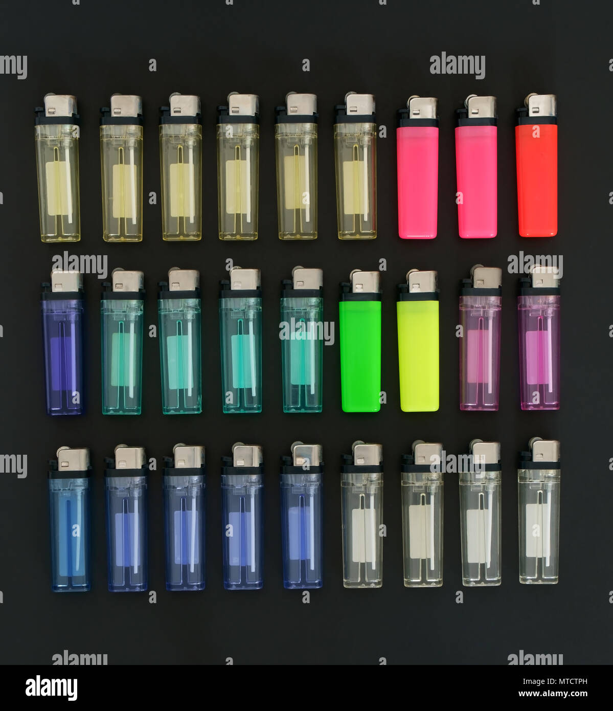 Cigarette lighter on black paper background. Top view. Flat lay Stock ...