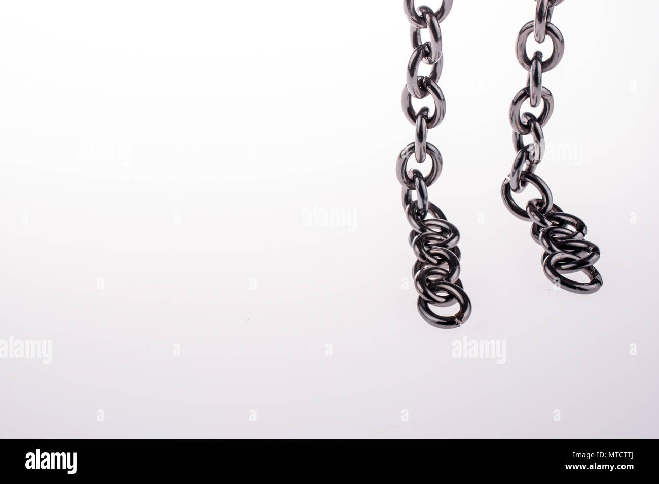 metal chain on white background Stock Photo - Alamy