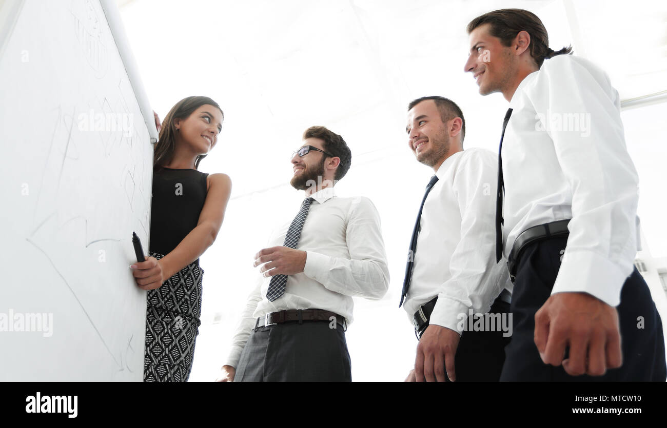 coach conducts training with business team Stock Photo - Alamy