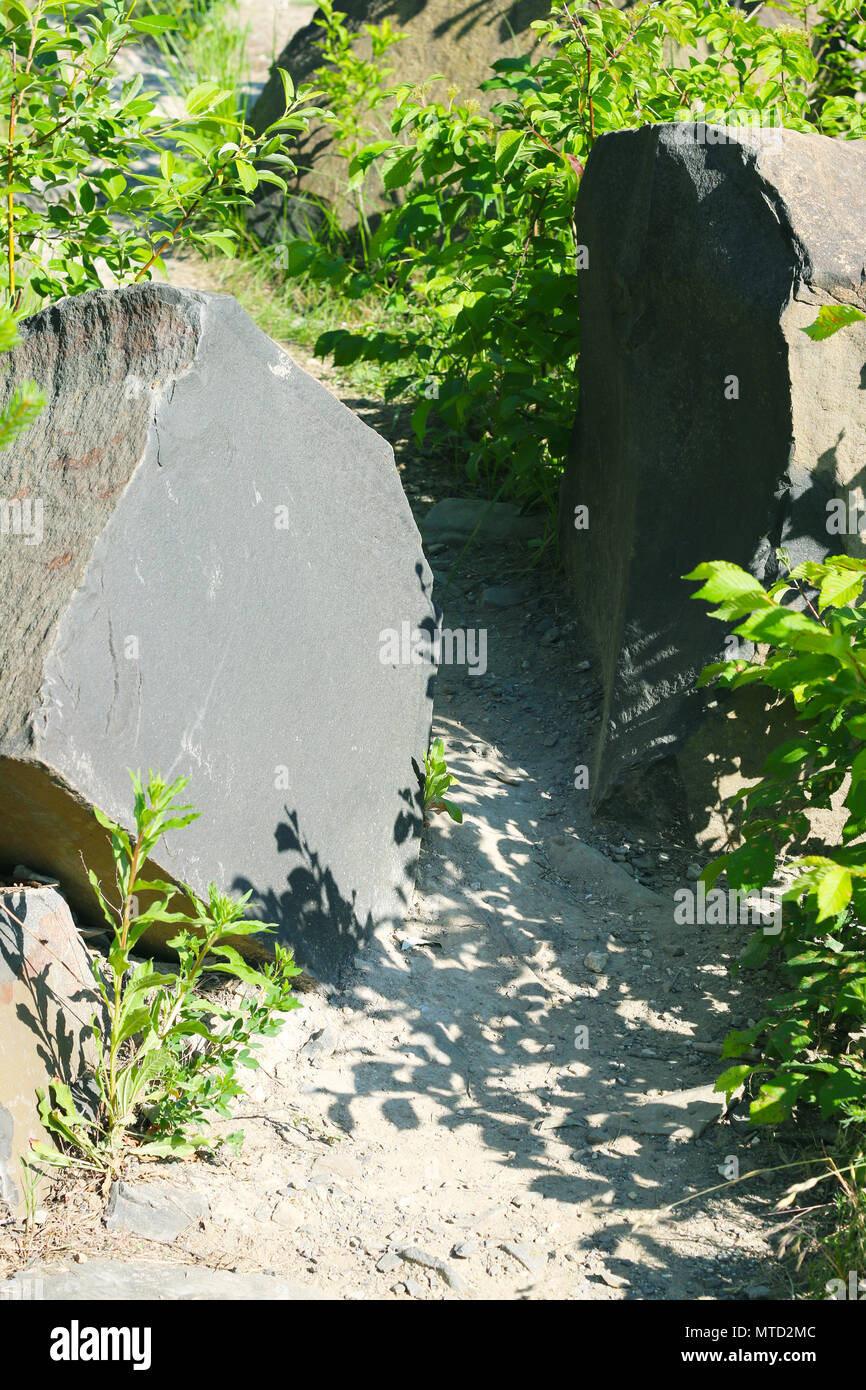 Two large basalt stones on trail. Beautiful geological landscape Stock ...
