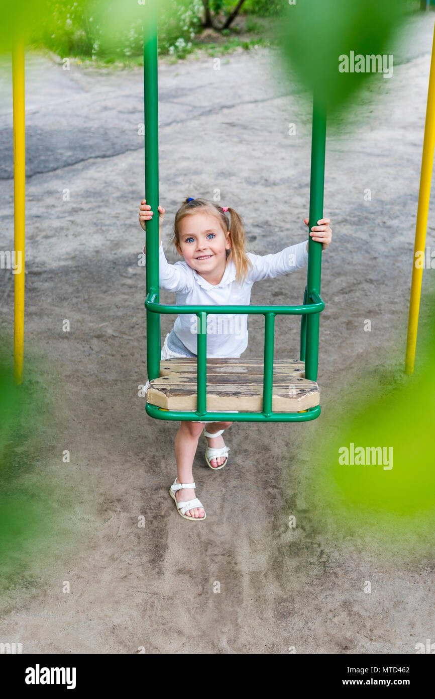 Child rocking swing Stock Photo - Alamy