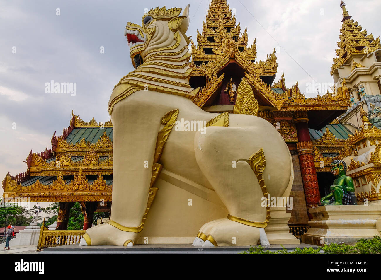 Guardian Lion of Shwedagon Pagoda in Yangon, Myanmar Stock Photo - Alamy