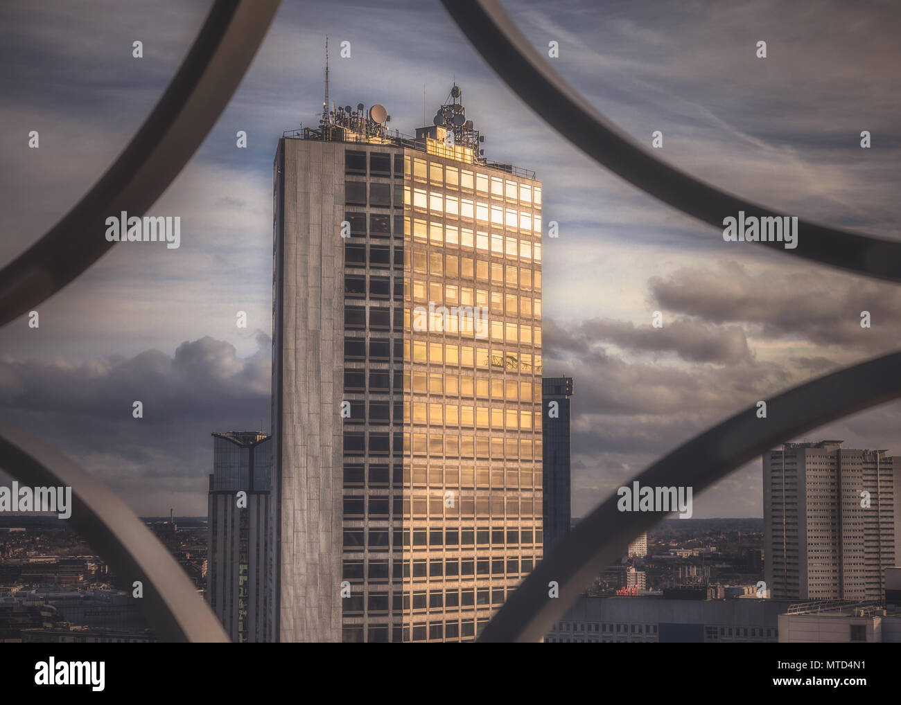 The Alpha Tower in Birmingham, UK framed by the outside of the ...
