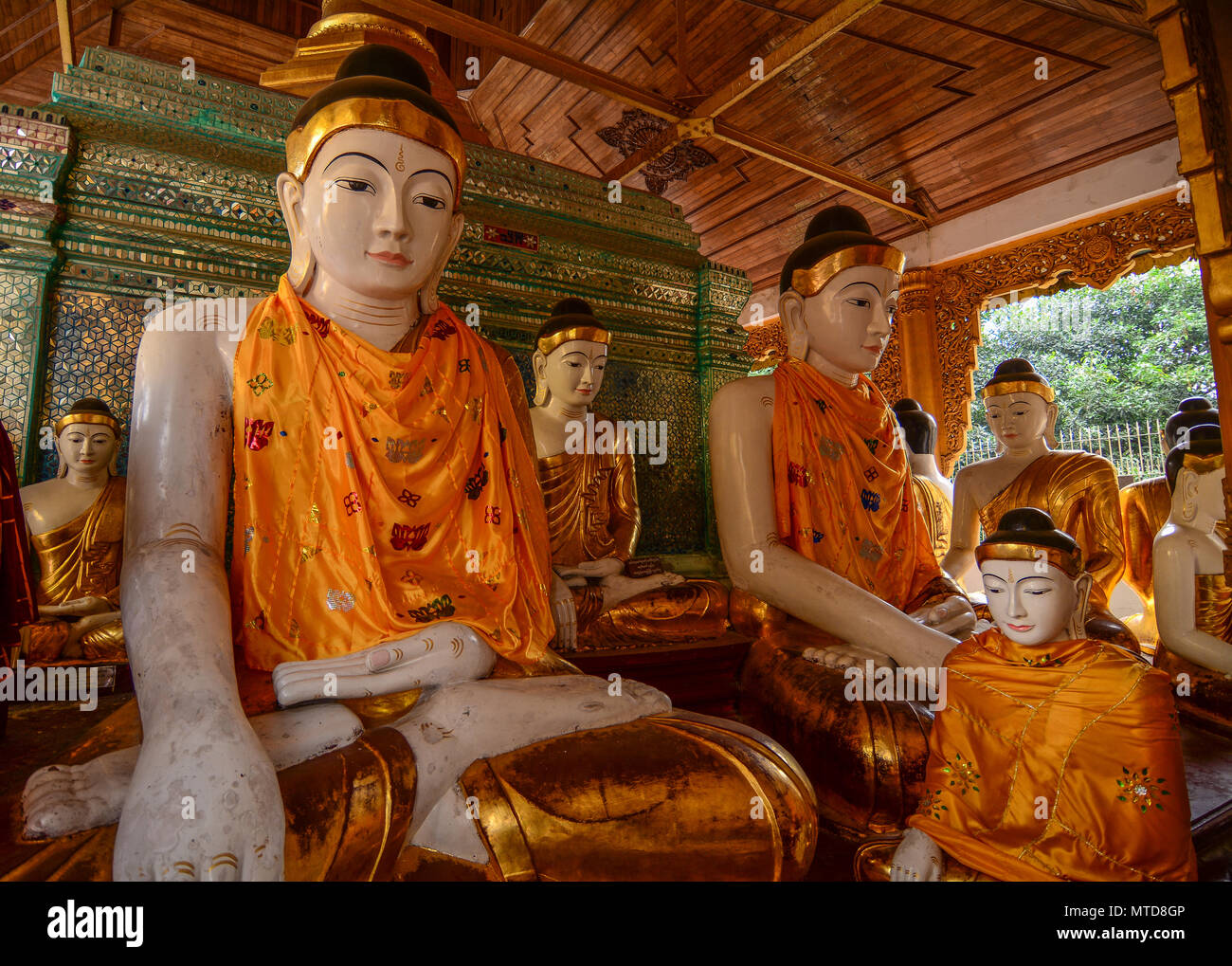 Ancient Buddha statues at Shwedagon Pagoda in Yangon, Myanmar Stock Photo - Alamy