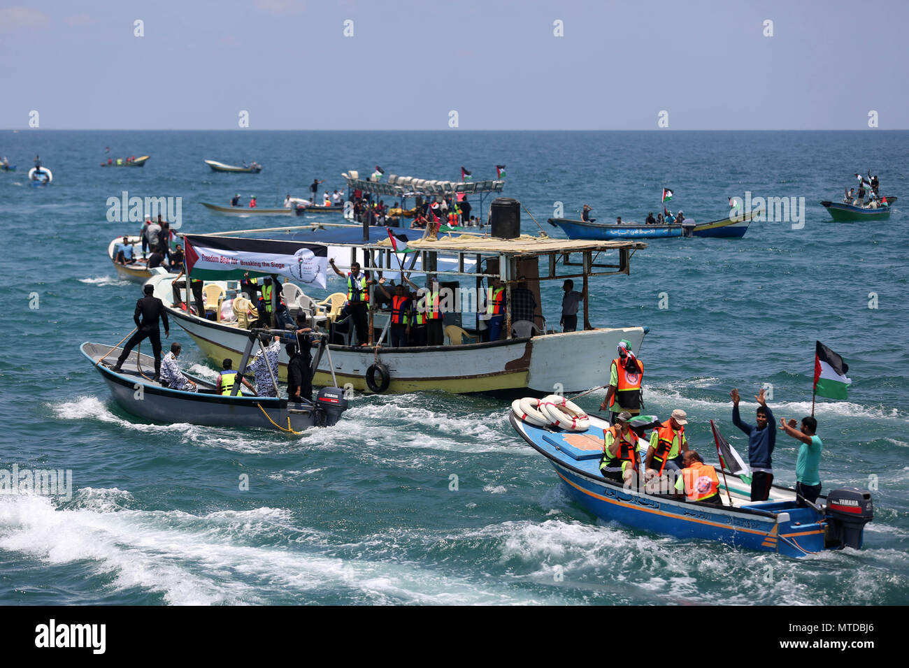Gaza City, Gaza. 29th May, 2018. Palestinian activists ride fishing ...